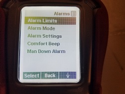 How do you check and change the alarm limits in the MultiRAE monitors